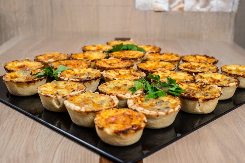 Assorted Mini Quiches on Tray: Bite Sized Savory Tarts with Various ...