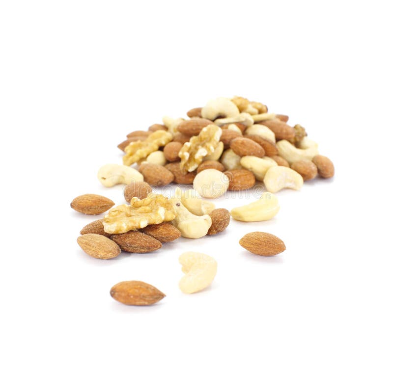 Different Nuts Falling into Pile on Background Stock Photo - Image of ...