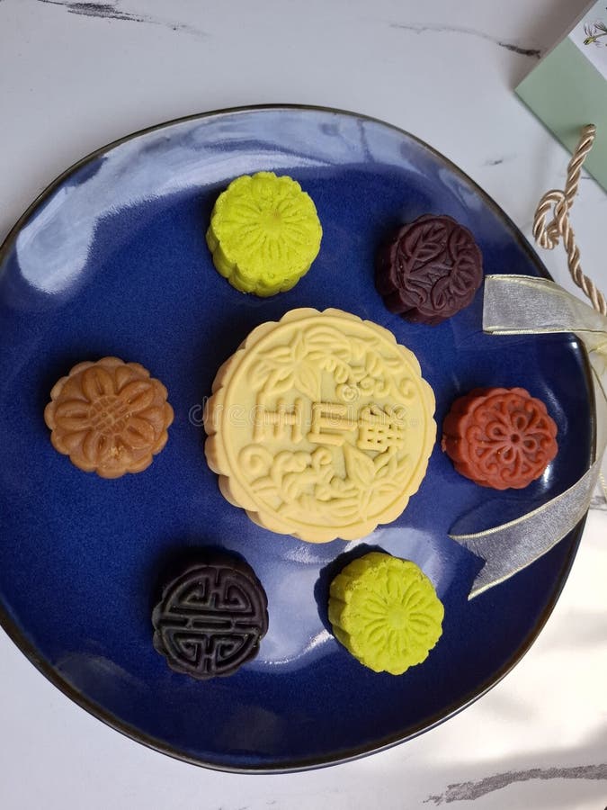 Assorted Mooncake on the Ocean Blue Plate Stock Image - Image of blue ...