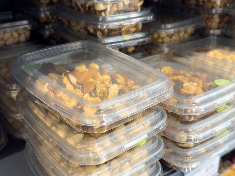 Assorted Nut Mix in Plastic Containers on Store Shelf Display Editorial ...