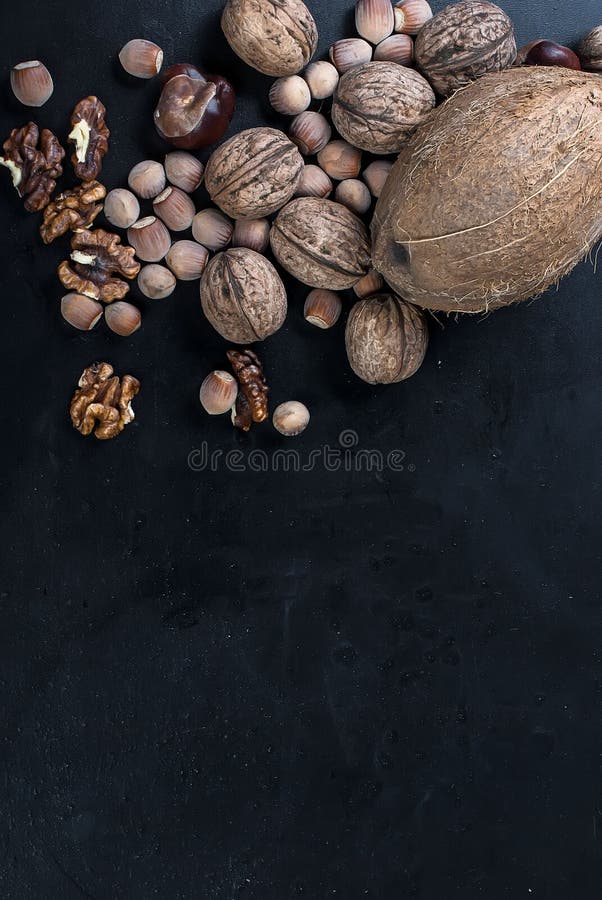 Assorted Nuts on a Black Background Stock Image - Image of mixed ...