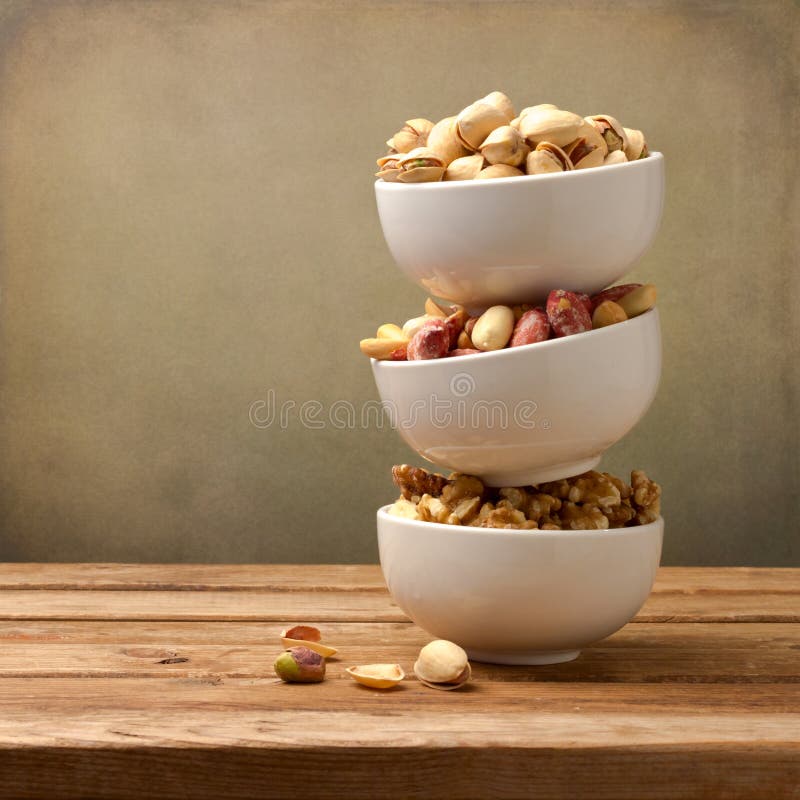 Assorted nuts in dishes stock image. Image of life, bishvat - 28487441
