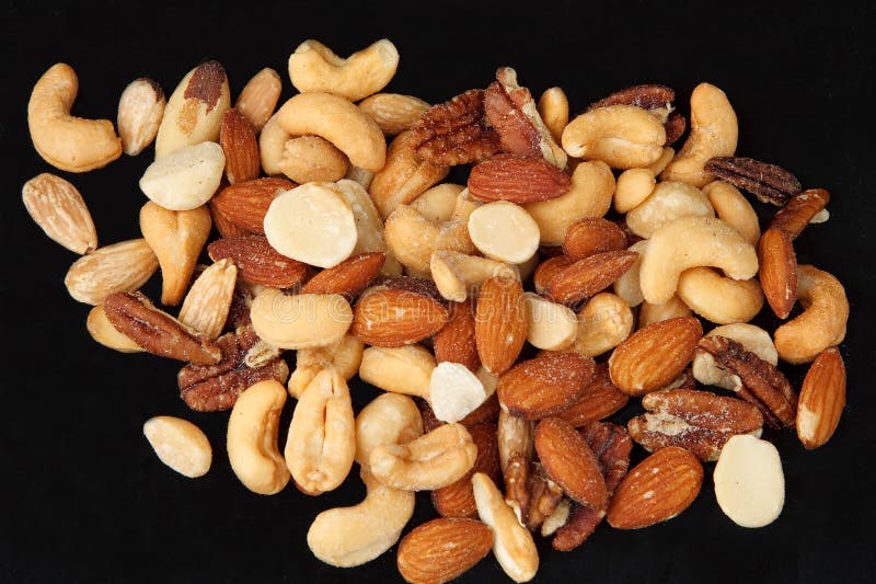 Assorted Nuts Isolated on Black Stock Photo - Image of cashew ...
