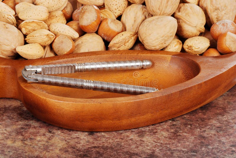 Assorted nuts in wood bowl stock photo. Image of autumn - 22788676