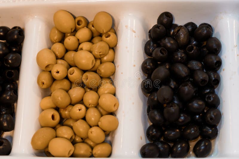 Assorted Olives in a White Tray Perfectly Displayed Stock Photo - Image ...