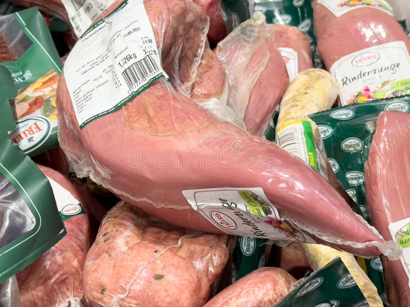 Assorted Packaged Meats Including Tongue and Sausage in Grocery Store ...