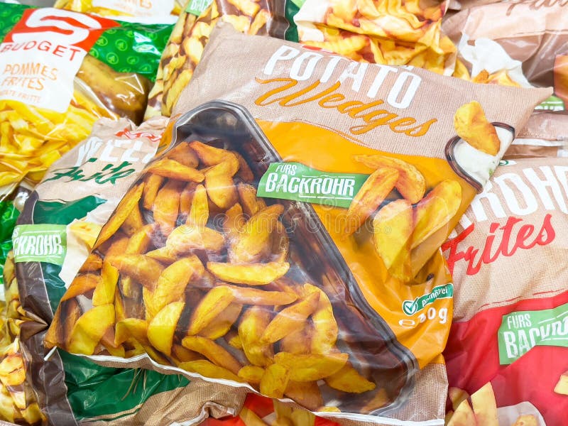 Assorted Packaged Potato Wedges Chips Variety Display Closeup Editorial ...