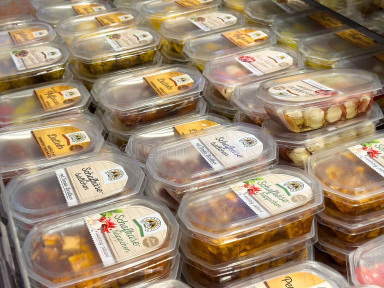 Assorted Packaged Sweets on Display in Transparent Containers Editorial ...