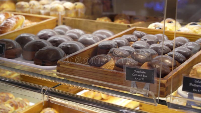 Assorted Pastry and Bread Arranged on Tray Selling at Bakery Shop Stock ...