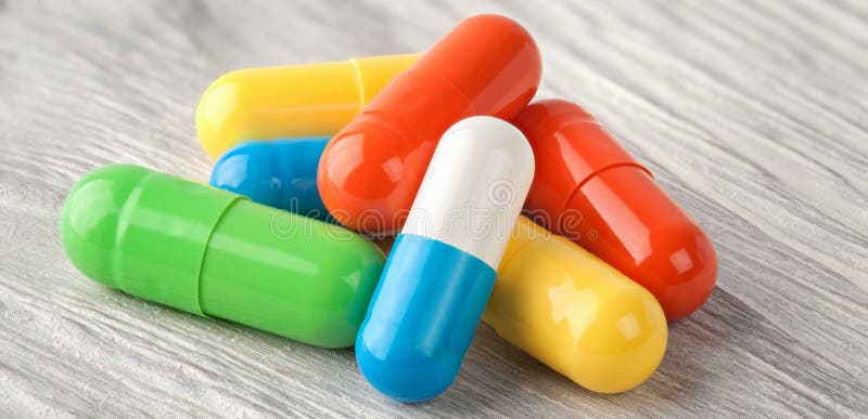 Assorted Pharmaceutical Drugs of Different Colors in Capsules Close-up ...