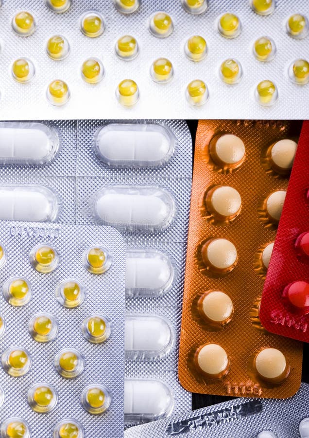 Assorted Pills in Sealed Packs Stock Photo - Image of sealed, caplets ...