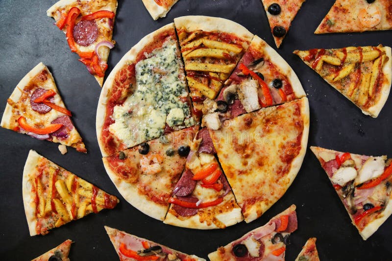 Assorted Pizza Slices on Black Surface Stock Image - Image of dinner ...