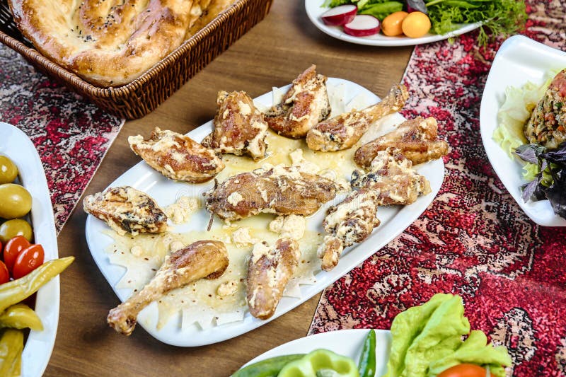 Assorted Plates of Food on a Well-Set Table Stock Photo - Image of ...