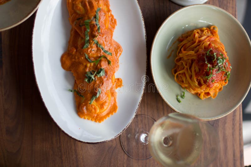 Assorted Plates Of Pasta On A Table Stock Image - Image of basil ...