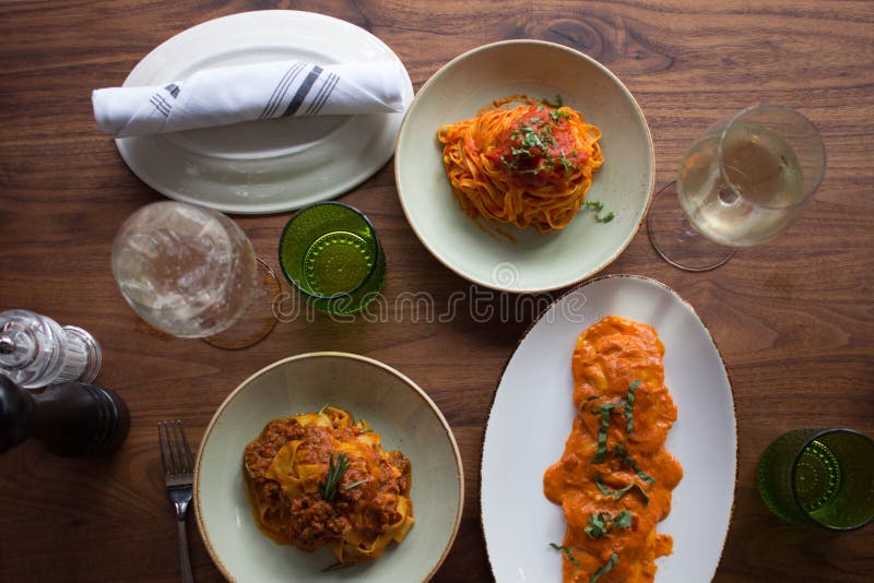 Assorted Plates of Pasta on a Table Stock Image - Image of cooked ...