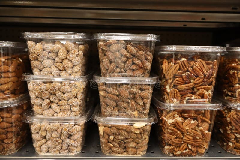 Assorted Premium Nuts in Plastic Containers Stock Photo - Image of ...