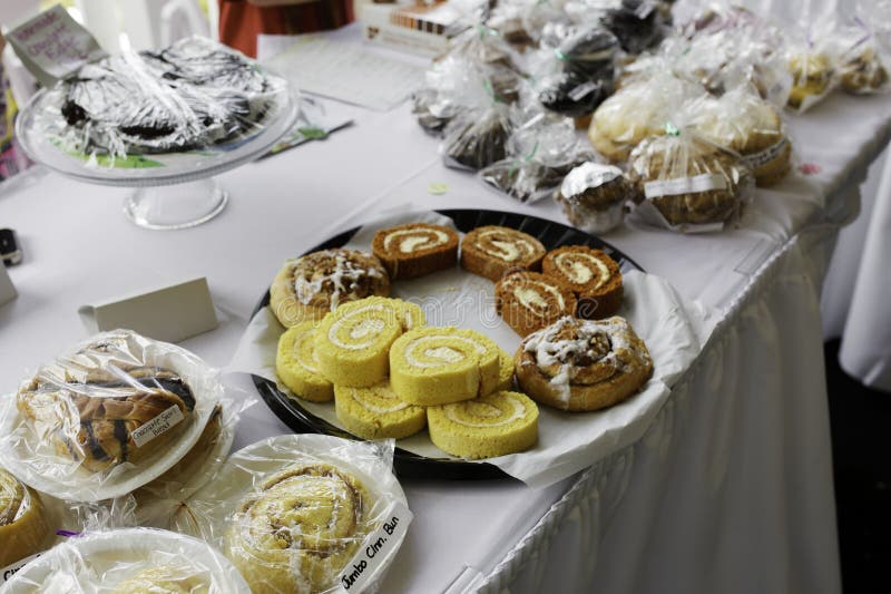 Assorted Rolls and Pastries Individually Wrapped, Displayed Stock Photo ...