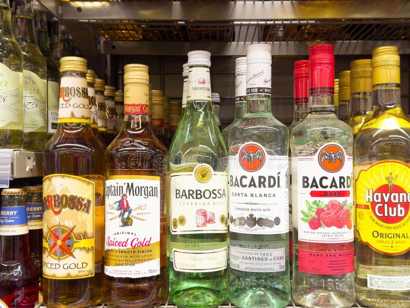 Assorted Rum Bottles on Liquor Store Shelf Featuring Popular Brands ...