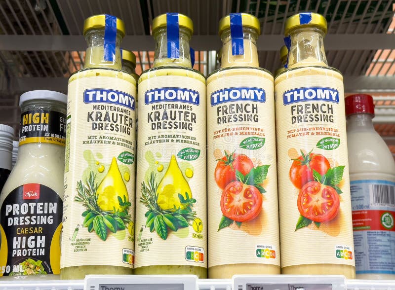 Assorted Salad Dressings on Store Shelf with Nutritional Labels ...