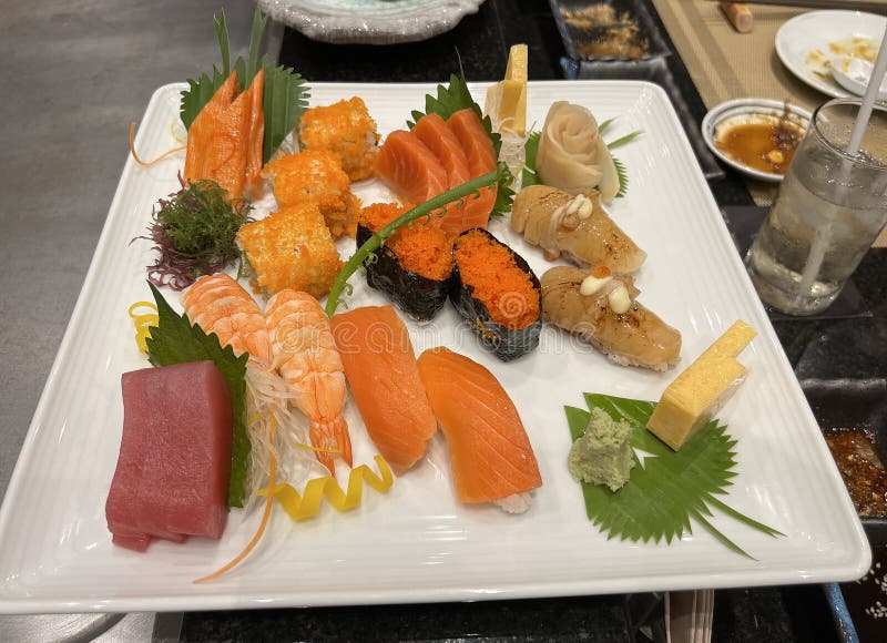 An Assorted Sashimi Set Served with a Variety of Nigiri Sushi Stock ...