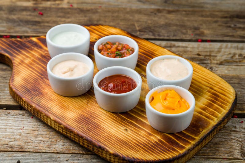 Assorted Sauces Top View on Wooden Table Stock Image - Image of tasty ...