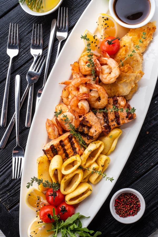 Assorted Seafood, Cod, Salmon, Tiger Prawns Tails, Squid and Oyster ...