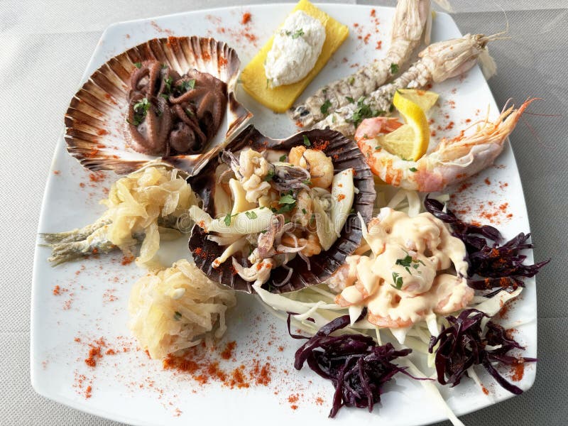 Assorted Seafood Platter with Shrimp, Crab, and Shellfish Garnished ...