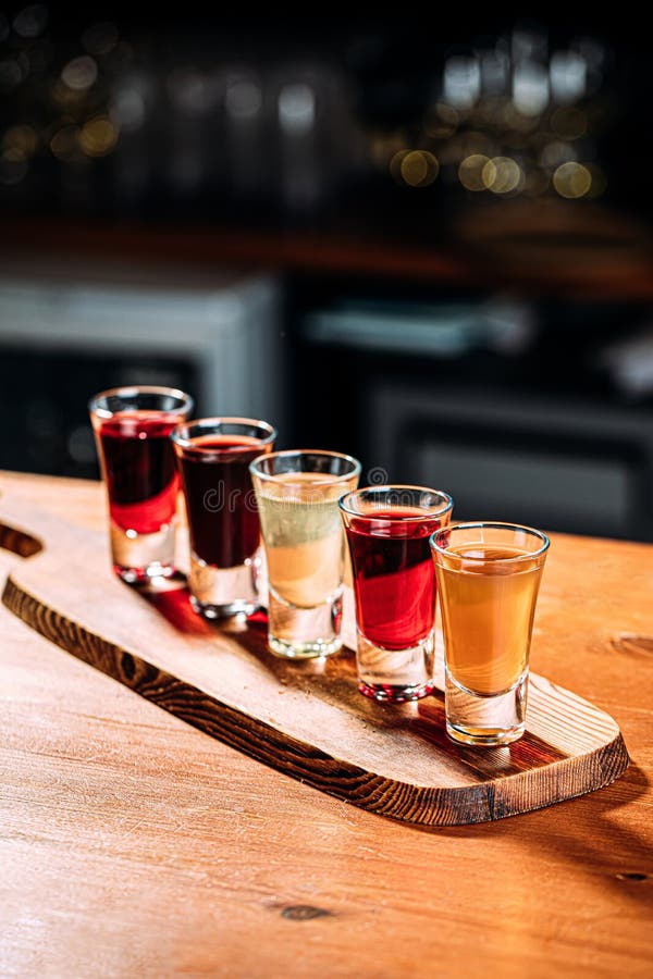 Assorted Shot Drinks on the Wooden Bar Desk Stock Photo - Image of ...