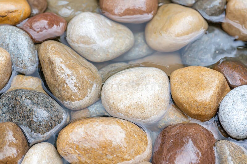 Assorted Smooth River Rocks in Water Stock Illustration - Illustration ...