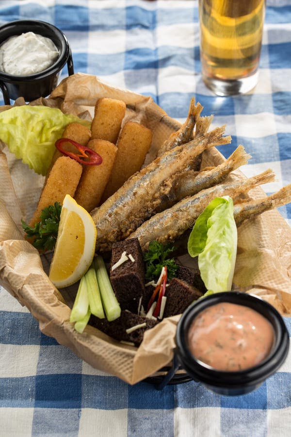 Assorted Snacks Like Deep Fried Fish, Mozzarella Sticks, Rye Bread ...