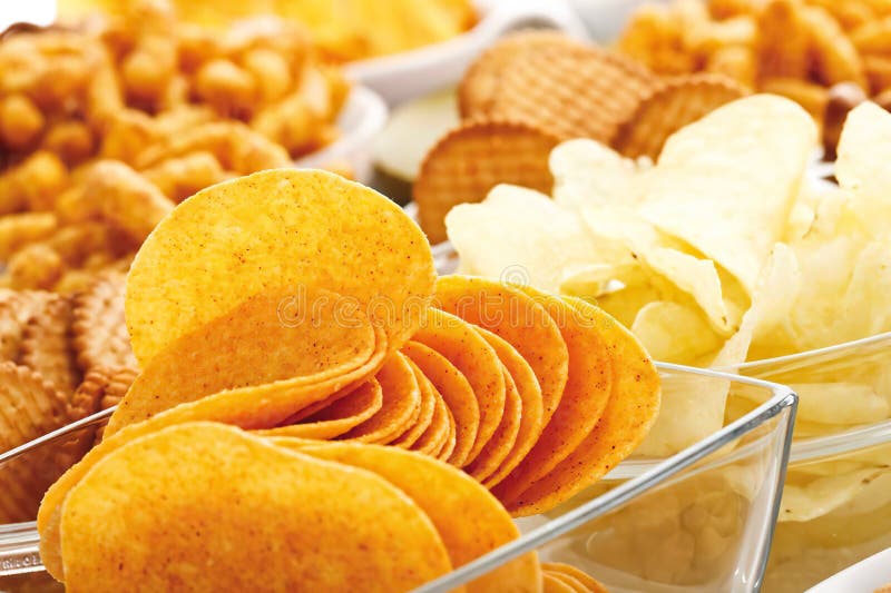 Assorted Snacks, Potato Chips in the Bowl, Close-up. Stock Photo ...