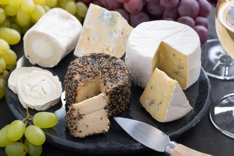 Assorted Soft Cheeses and Snacks To Wine, Close-up Stock Image - Image ...