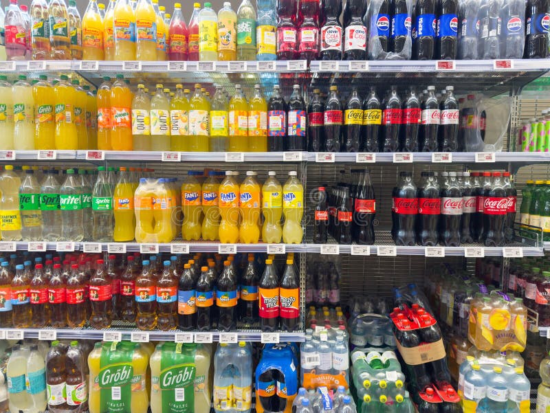 Assorted Soft Drinks on Supermarket Shelf Various Brands and Flavors ...