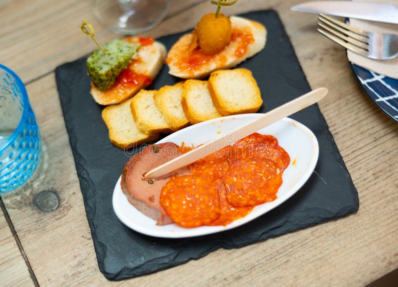 Assorted Spanish Tapas with Cheese and Sausage Stock Photo - Image of ...