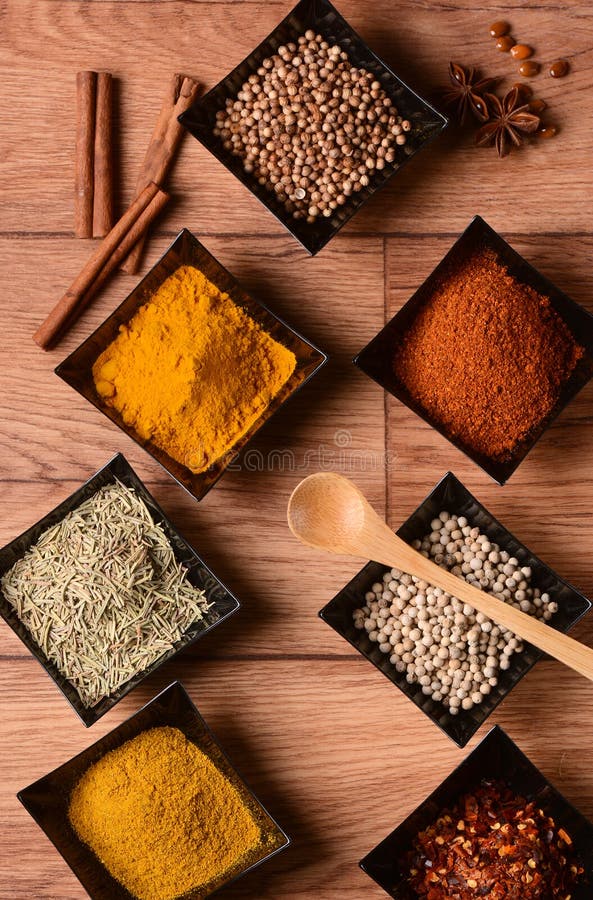 Assorted spices in bowls stock image. Image of cooking - 72152229