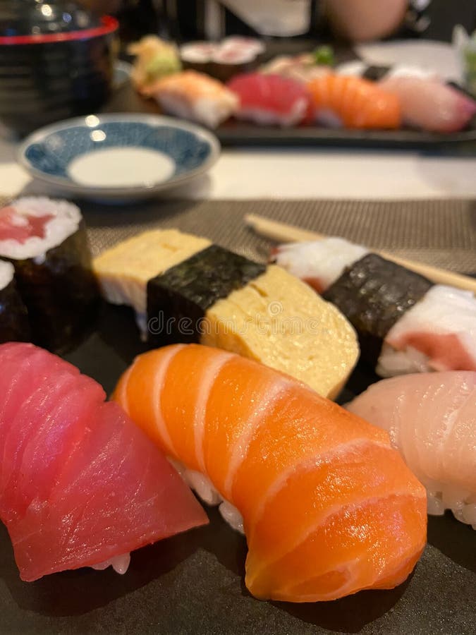 Assorted sushi stock image. Image of meal, black, cuisine - 218981911