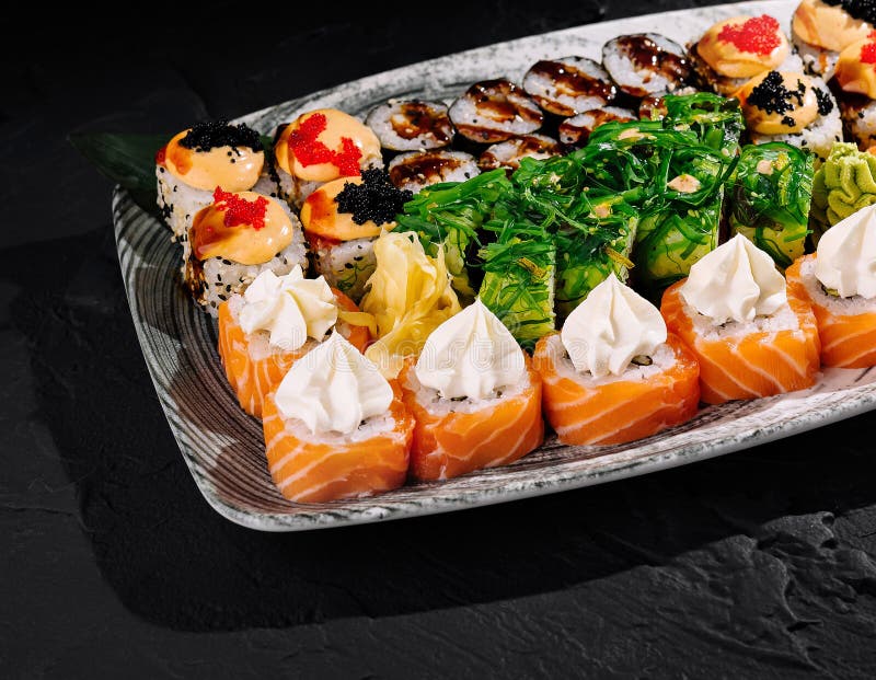 Assorted Sushi Platter on Dark Background Stock Photo - Image of ...