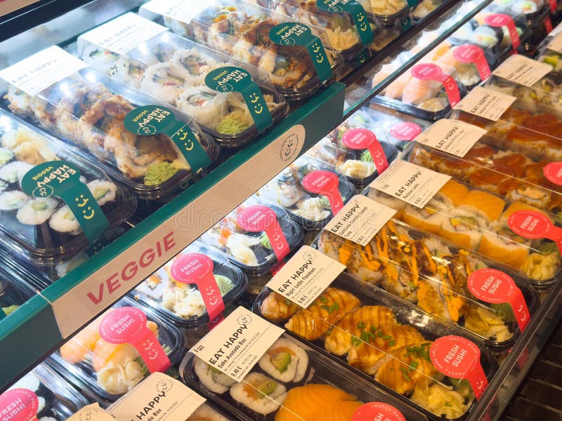 Assorted Sushi Platter Display in Grocery Store Refrigerated Section ...