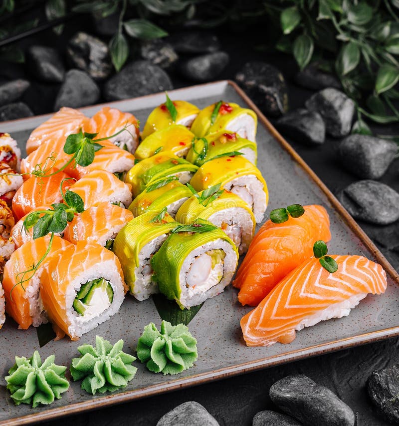 Assorted Sushi and Rolls Platter on Stone Background Stock Photo ...