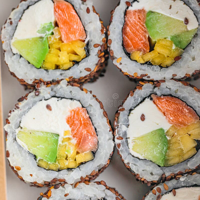 Assorted Sushi Rolls with Various Toppings in a Box Stock Photo - Image ...