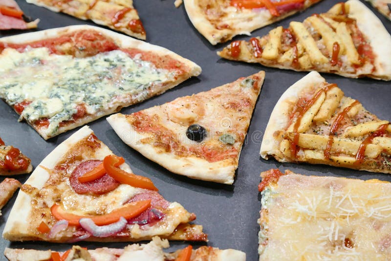 Assorted Types of Pizza on a Table Stock Image - Image of flavors ...
