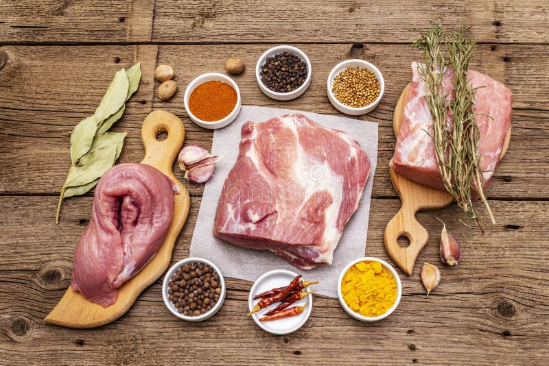 Assorted Various Fresh Pork Cuts. Raw Meat with Spices Stock Image ...