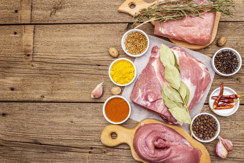Assorted Various Fresh Pork Cuts. Raw Meat with Spices Stock Photo ...