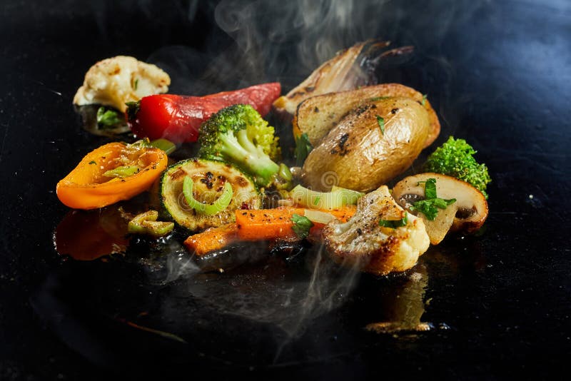 Assorted Vegetables Cooking on Hot Surface Stock Photo - Image of ...