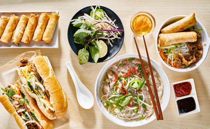 Assorted Vietnamese Dishes with Pho, Bahn Mi, Spring Rolls Stock Image ...