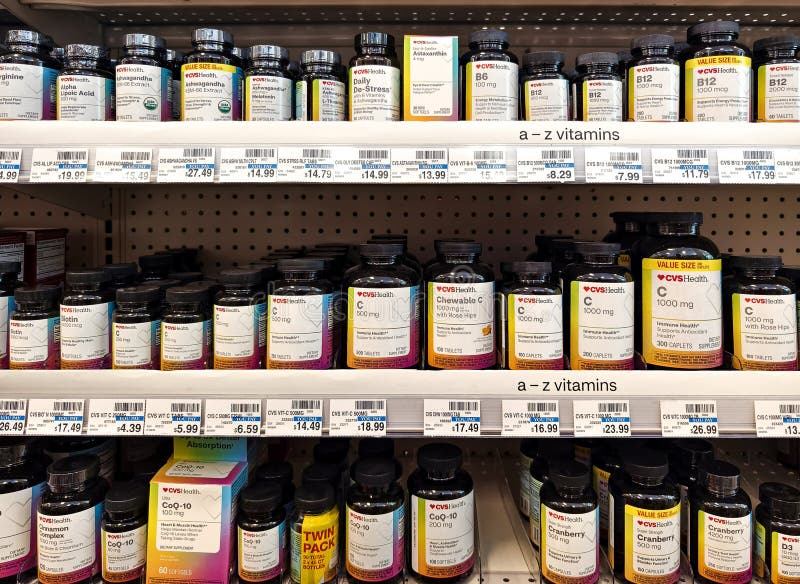 Assorted Vitamins and Supplements on Shelves at CVS Pharmacy Editorial ...