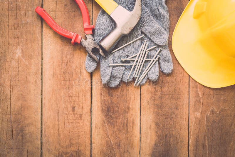 Assorted Work Tools on Wood Stock Photo - Image of glove, background ...