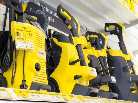 Assorted Yellow and Black Pressure Washers on Display in Hardware Store ...