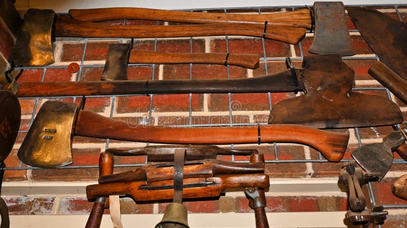 Assortment of Axes on a Wall Display Editorial Stock Image - Image of ...