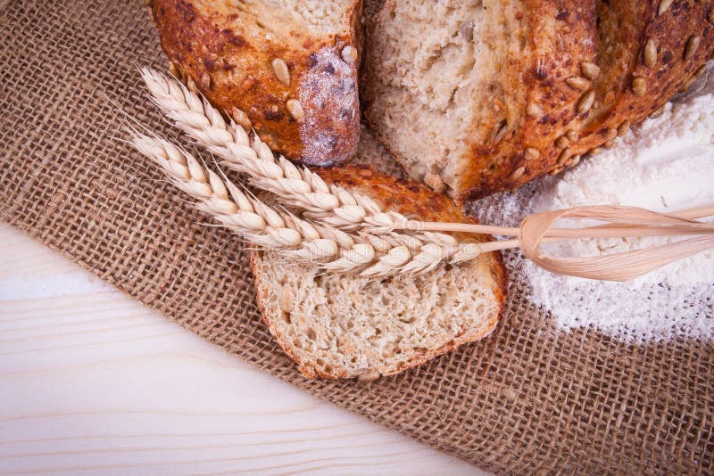 Assortment of Baked Bread on Wood Table Stock Photo - Image of bread ...